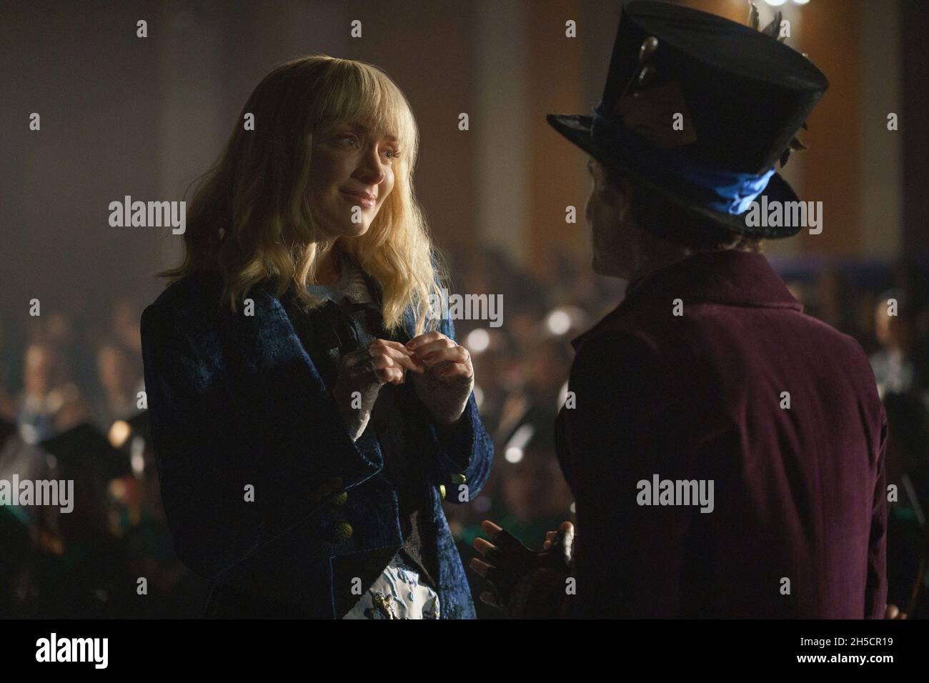 BATWOMAN, from left: Rachel Skarsten, Amitai Marmorstein as the Mad Hatter (back to camera), Mad ...