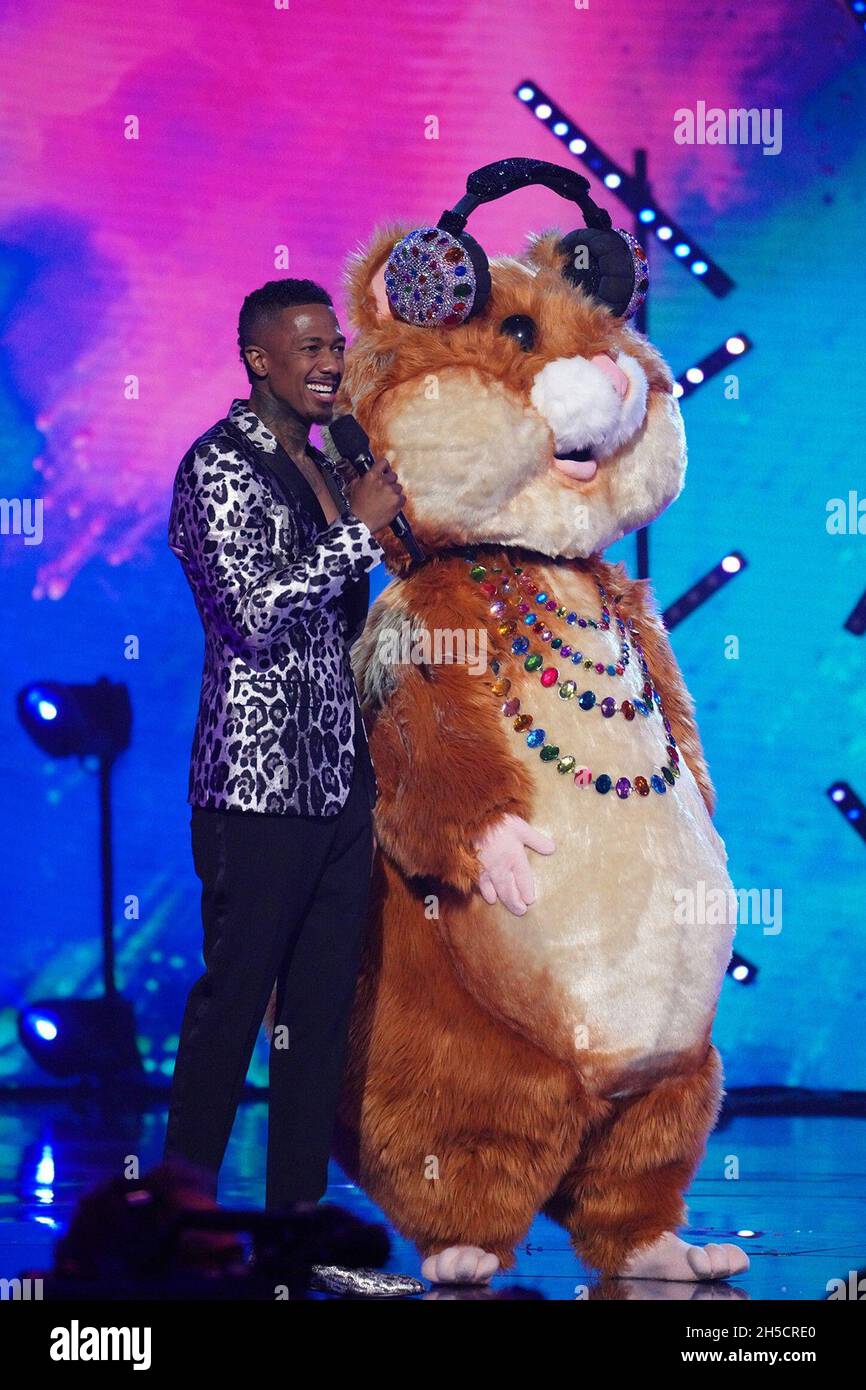 THE MASKED SINGER, from left: host Nick Cannon, Hamster, 'House Party ...