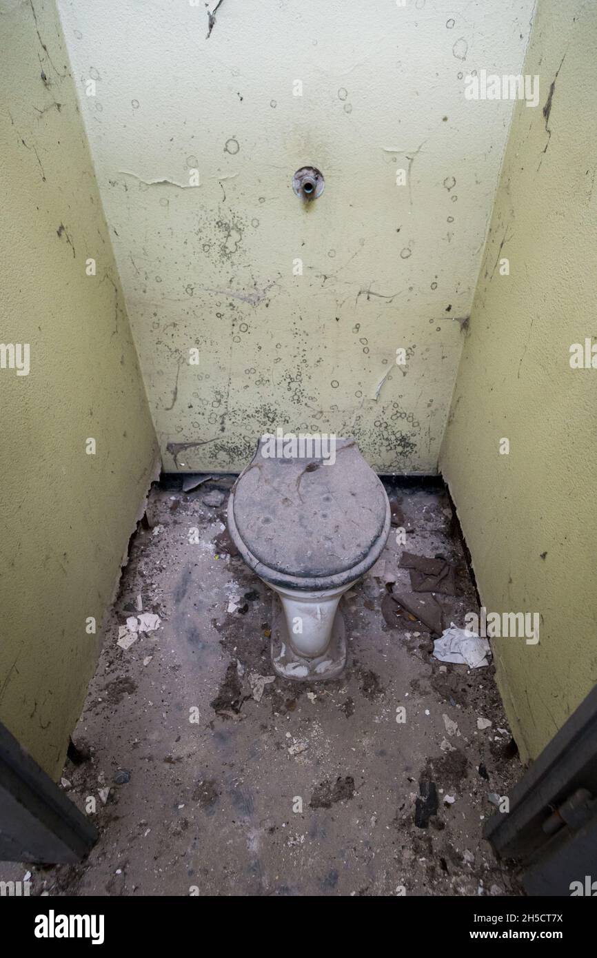 Vertical high-angle shot of an old destroyed and filthy toilet Stock ...