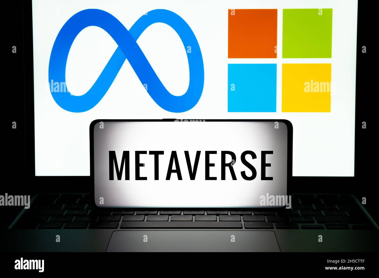 Silhouette of smartphone with METAVERSE word in front and blurred ...