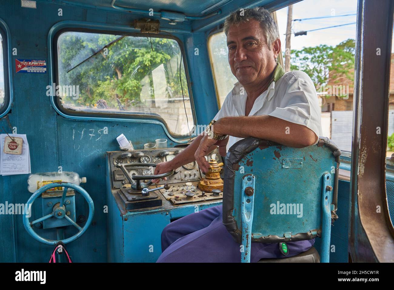 engine driver of the tourist train to the Valley des los Ingenios, Cuba ...