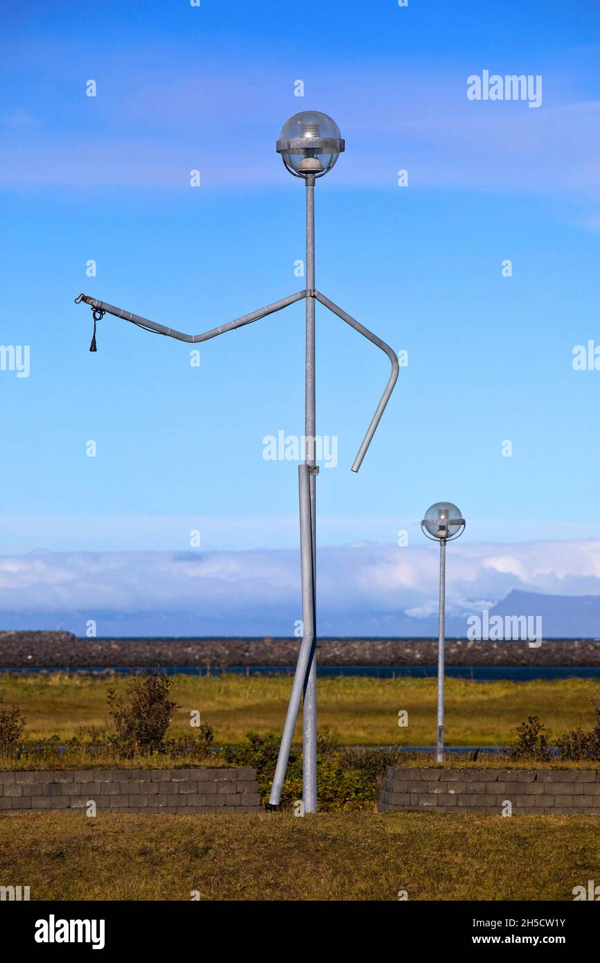 street lamp artistically designed as a male figure, Iceland, Reykjanes ...