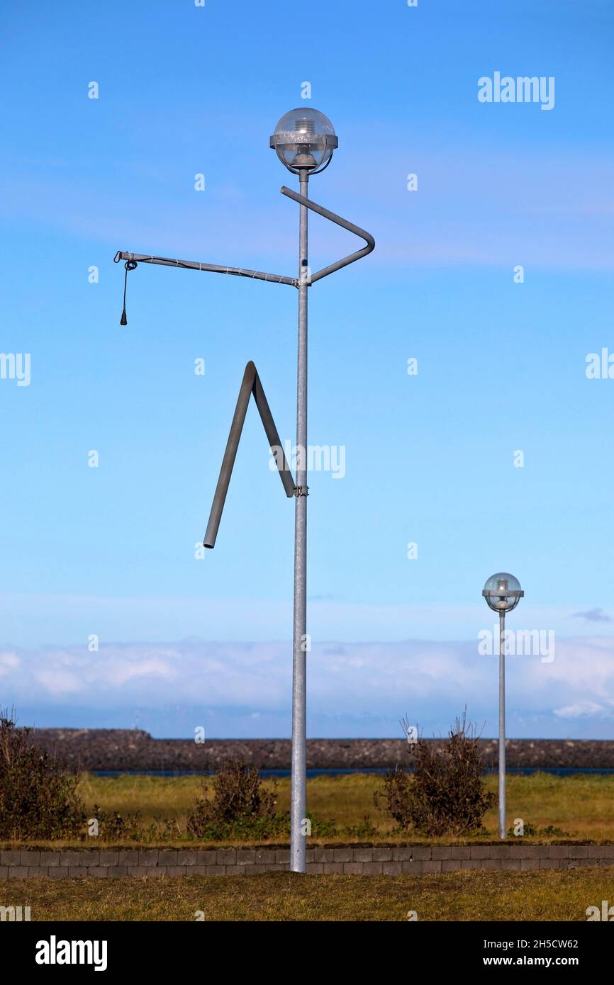 street lamp artistically designed as a male figure, Iceland, Reykjanes ...