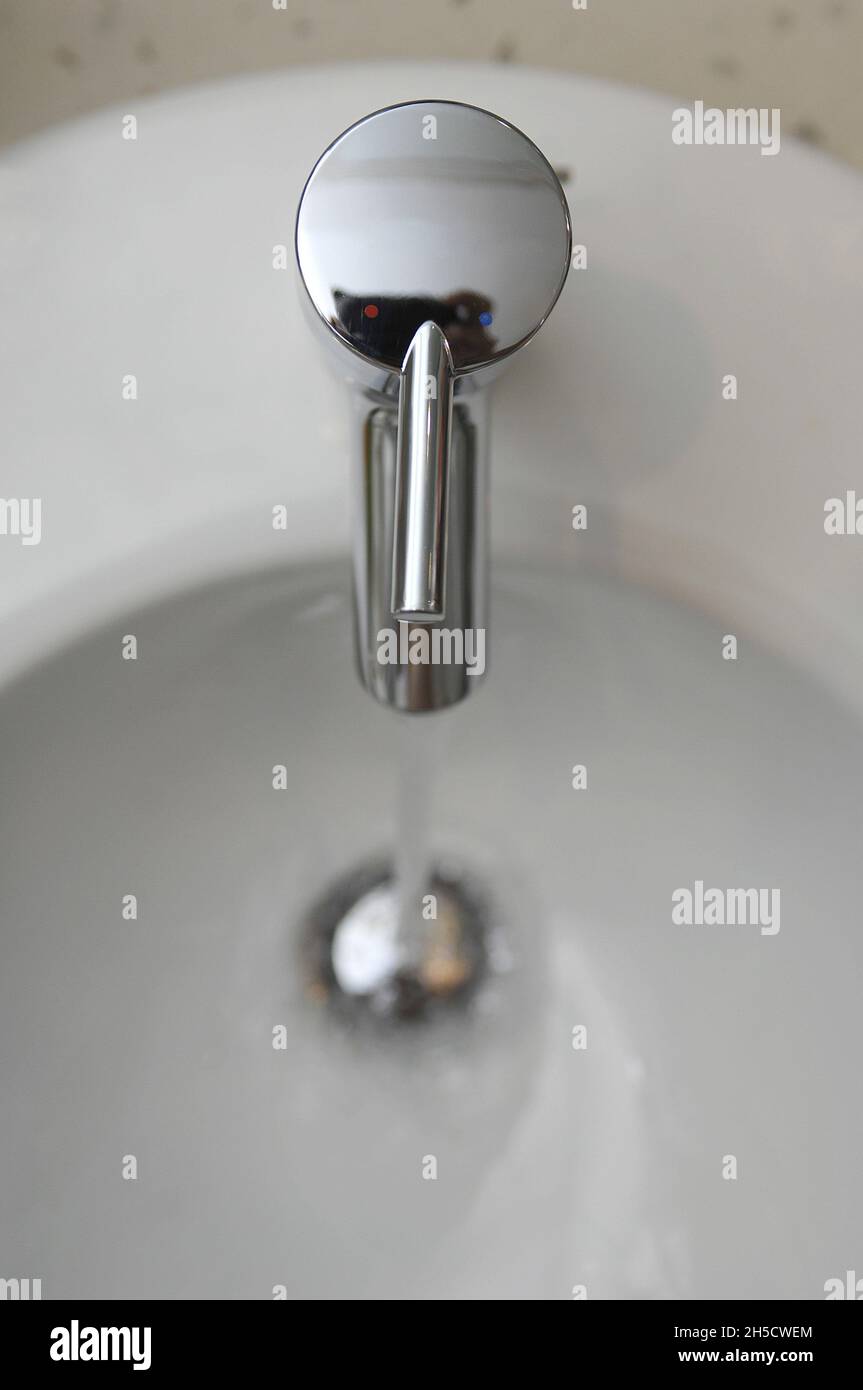 floating water in a water tap in a bathroom, Germany Stock Photo - Alamy