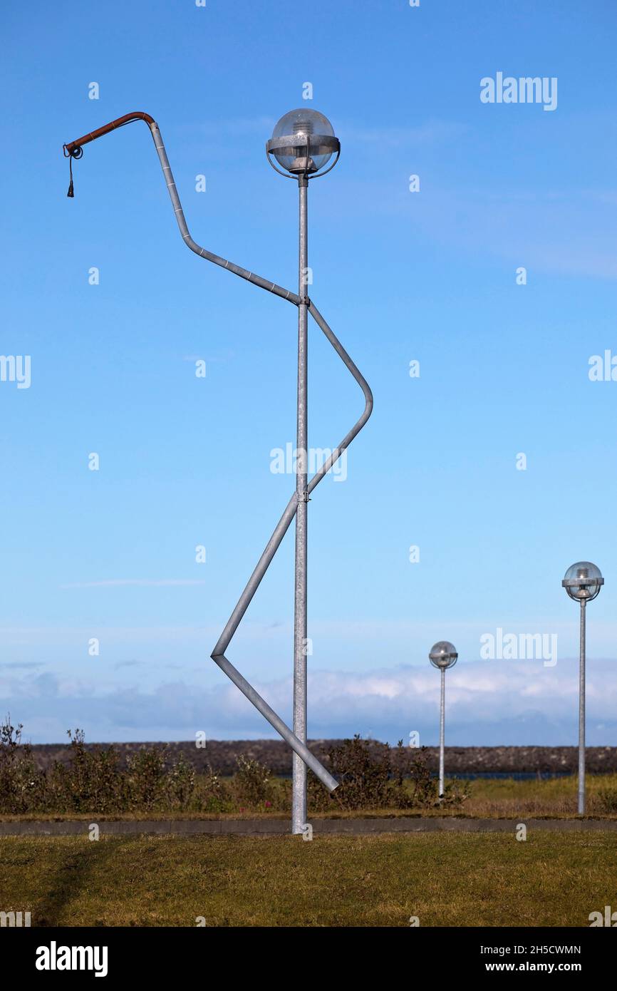 street lamp artistically designed as a male figure, Iceland, Reykjanes ...
