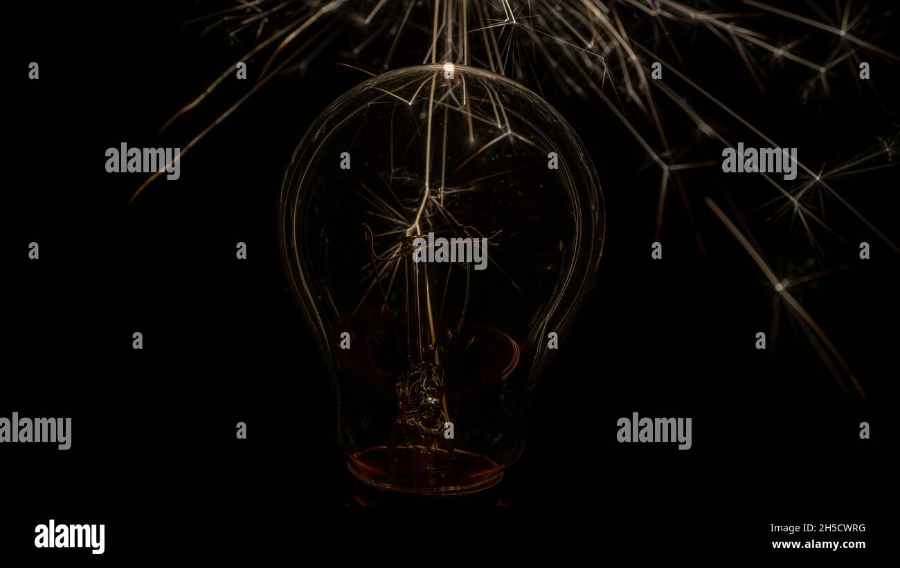 Closeup shot of a light bulb in the darkness Stock Photo - Alamy