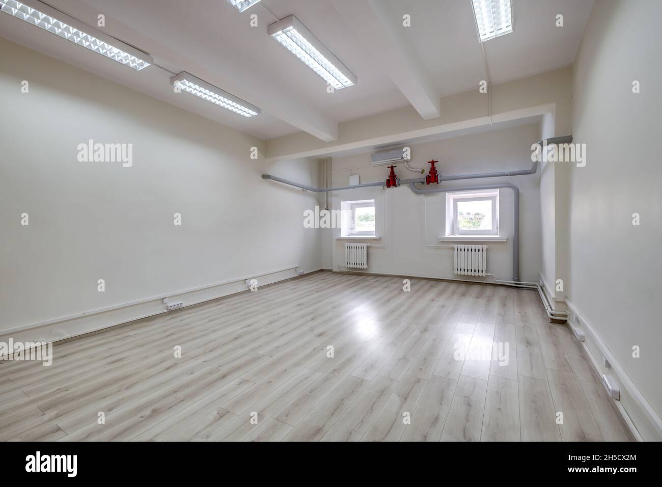empty white room with repair and without furniture. room for office or ...