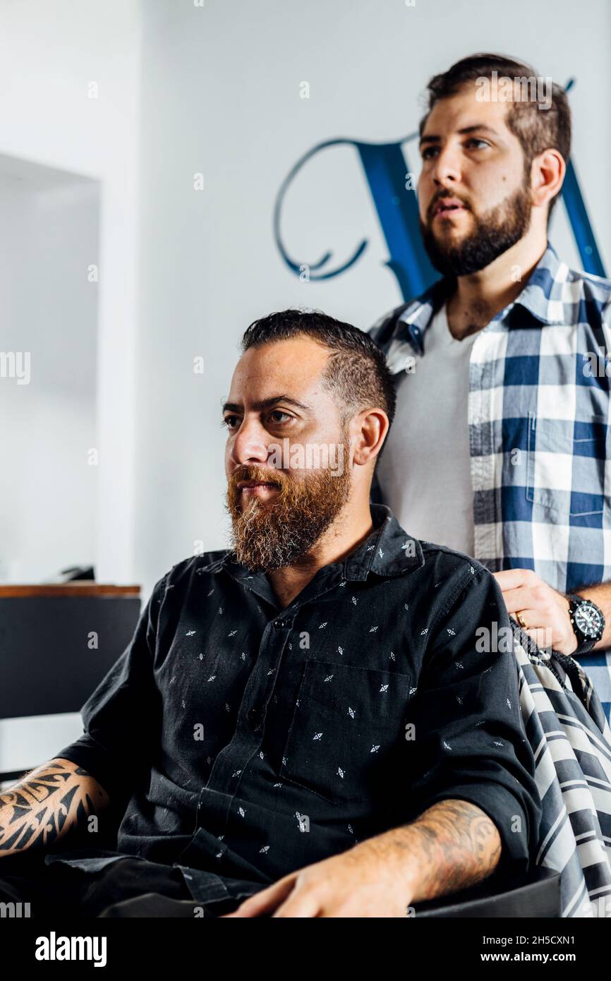 Barber waiting customer hi-res stock photography and images - Alamy
