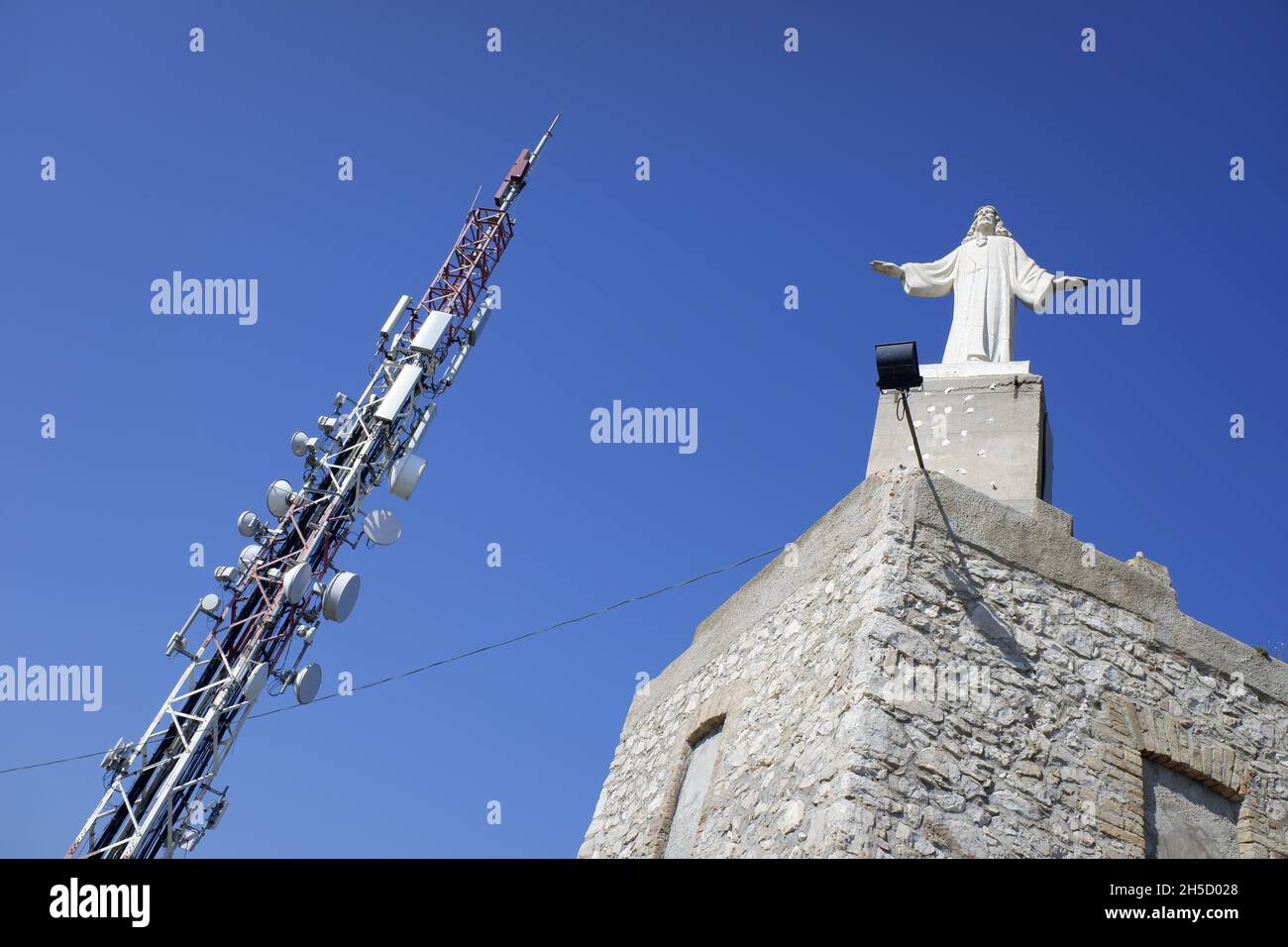 Tower with digital and terrestrial communications antenna, next to a ...