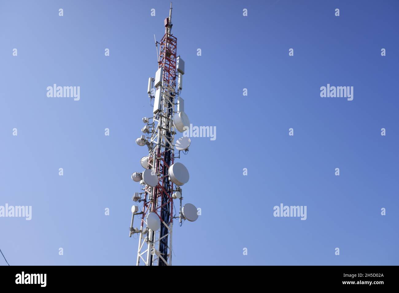 Tower with digital and terrestrial communications antenna, with copy ...