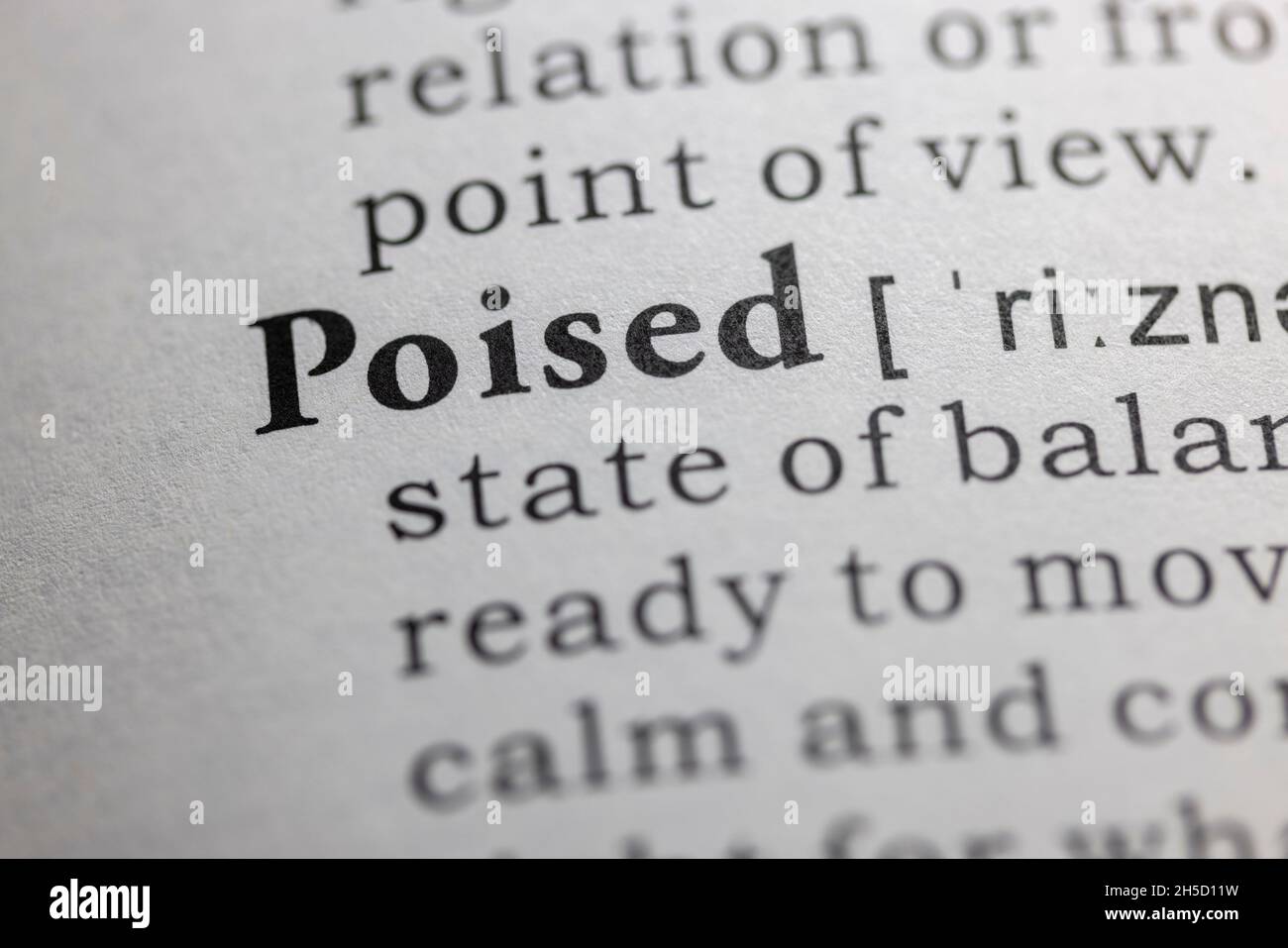 Fake Dictionary word, Dictionary definition of poised Stock Photo - Alamy