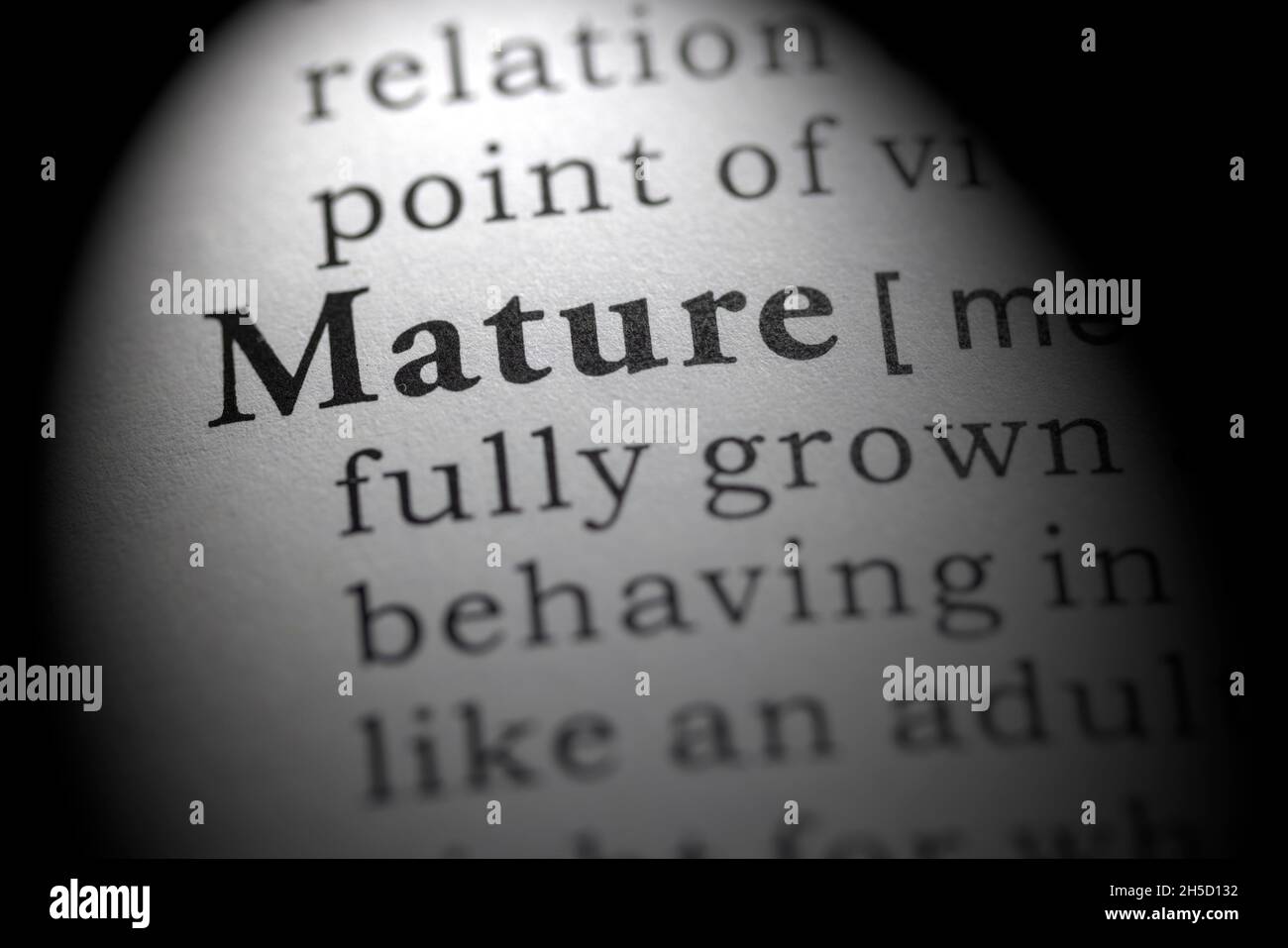 Fake Dictionary word, Dictionary definition of mature Stock Photo - Alamy