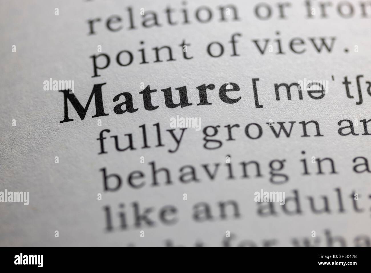 Fake Dictionary word, Dictionary definition of mature Stock Photo - Alamy