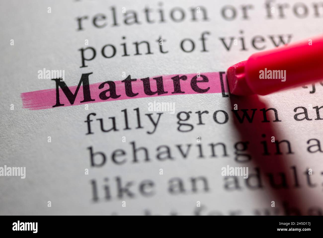 Fake Dictionary word, Dictionary definition of mature Stock Photo - Alamy