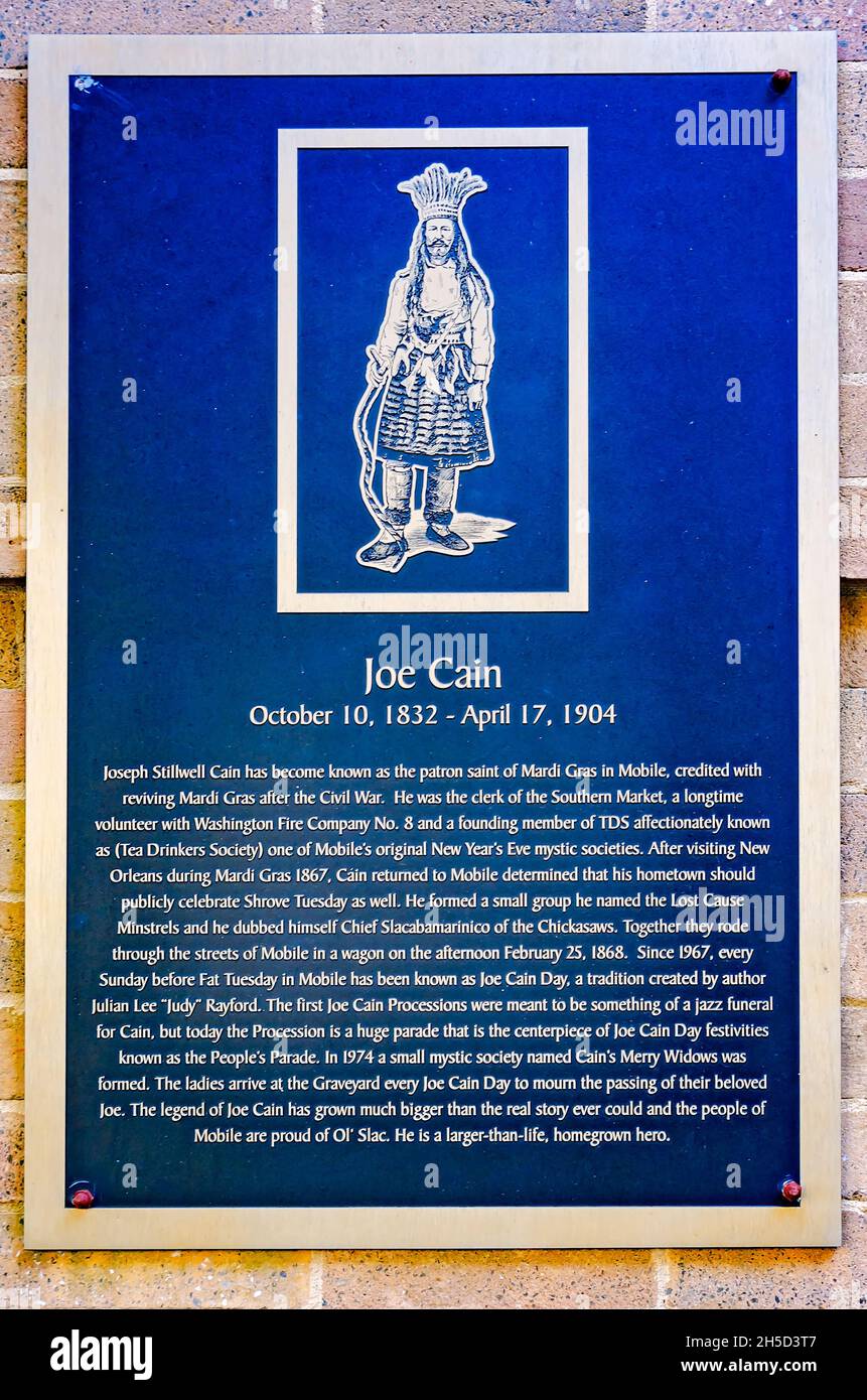 A plaque telling the history of Joe Cain, the patron saint of Mardi ...