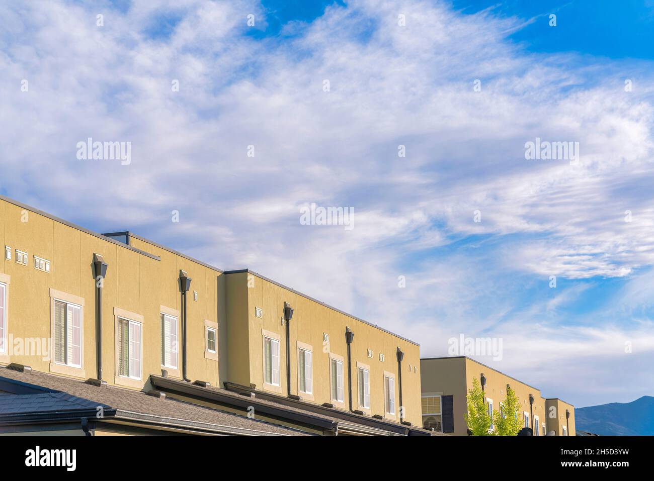 Modern townhouses with rain gutters at Daybreak, Utah Stock Photo - Alamy