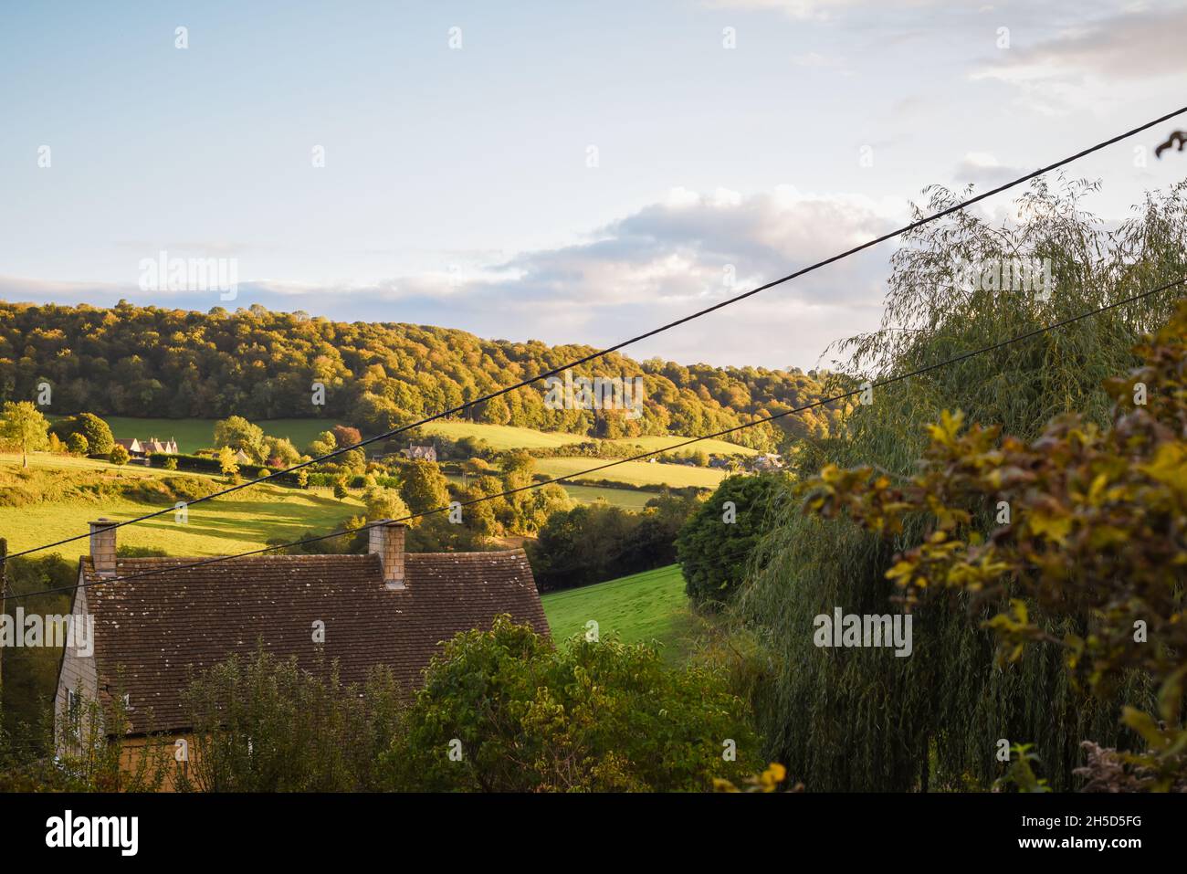 View over a beautiful valley with dramatic natural evening sunlight ...