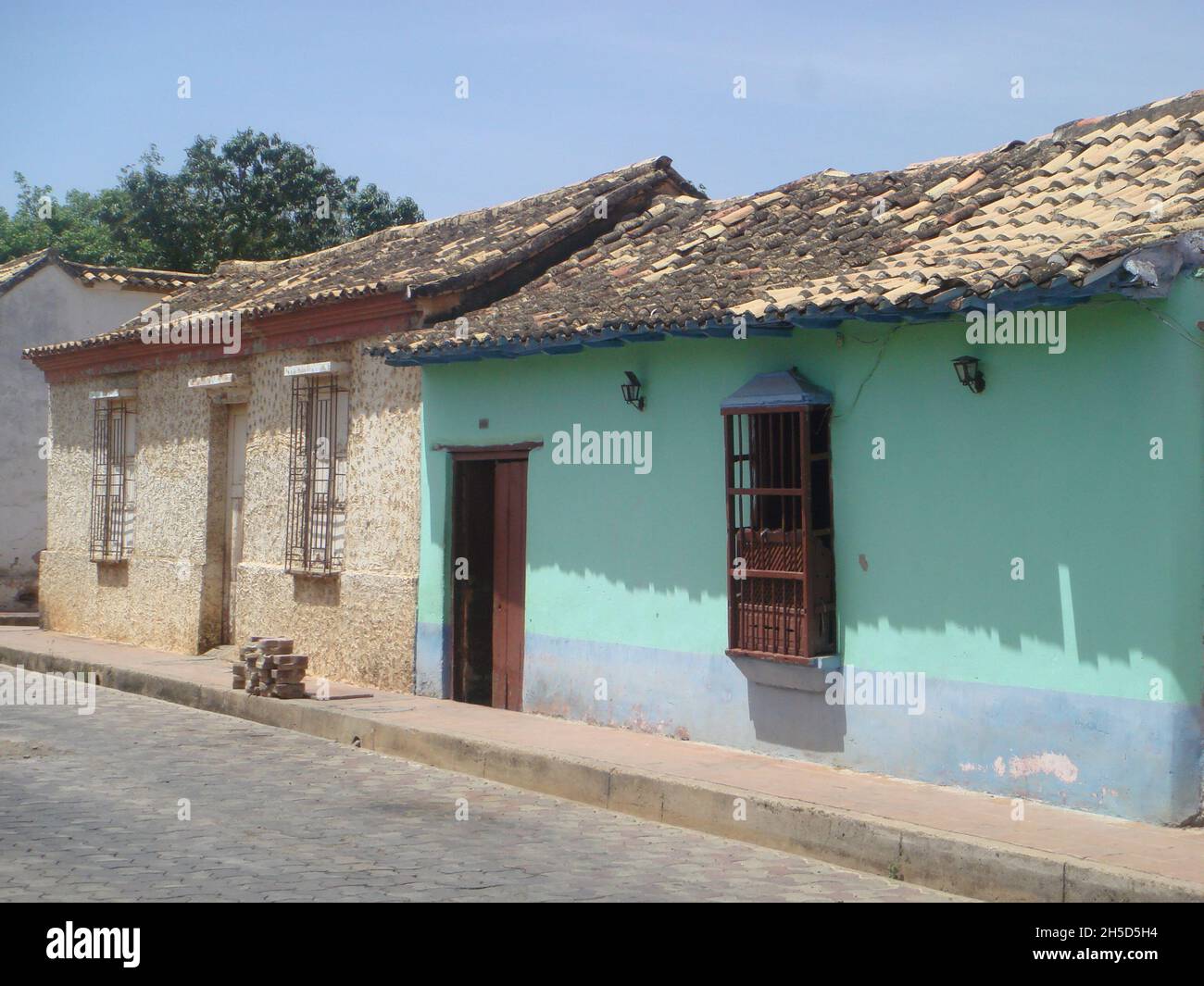 Side view of an entrance of the house building under the sunlight Stock ...