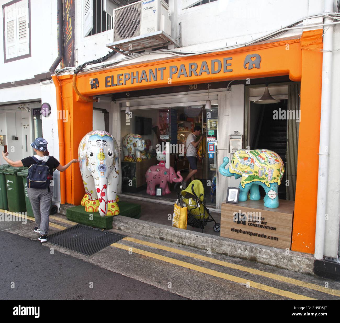 Elephant Parade shop with one person in the street at Haji Lane in ...