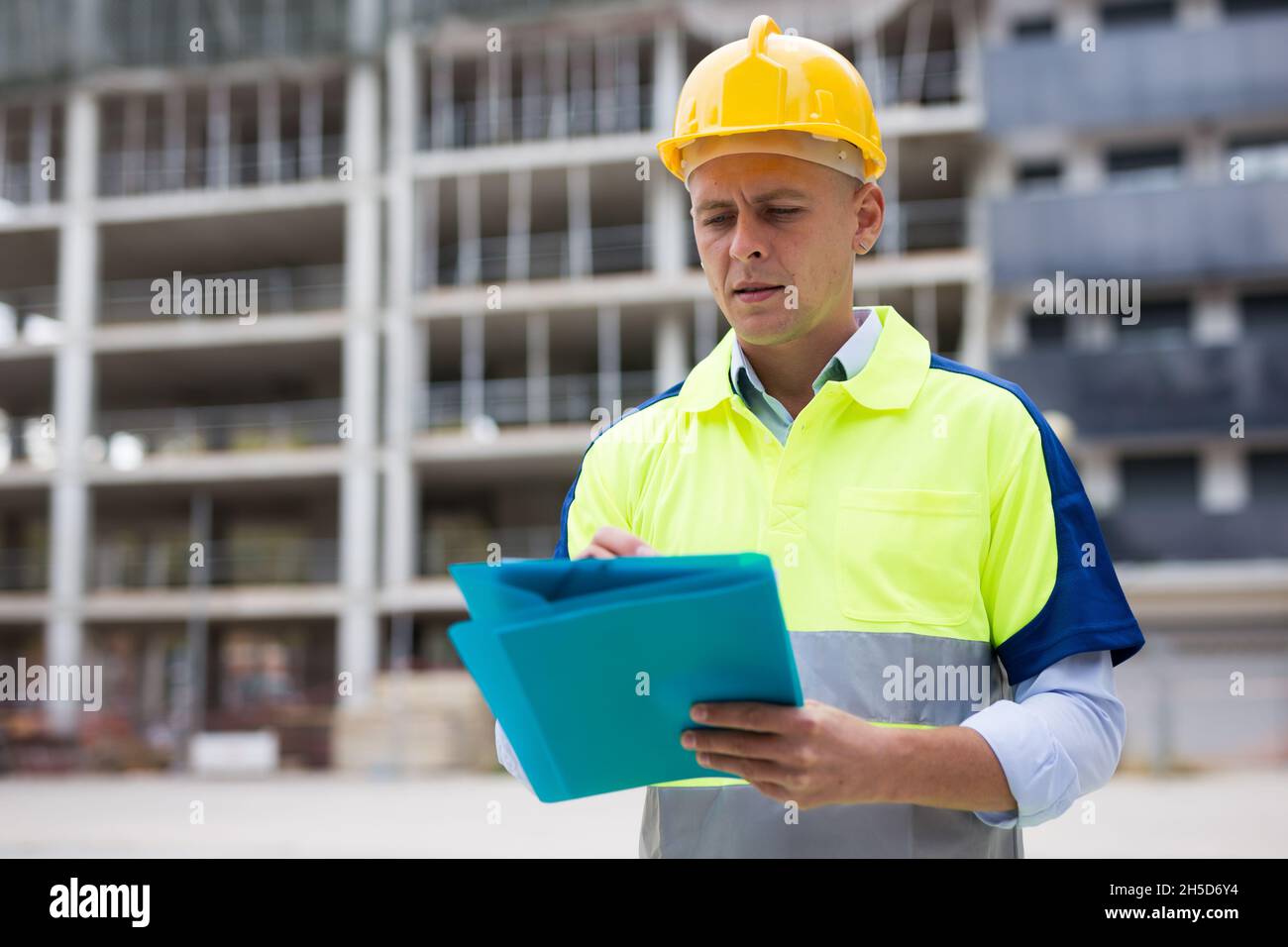 Construction engineer folder worker in hi-res stock photography and ...