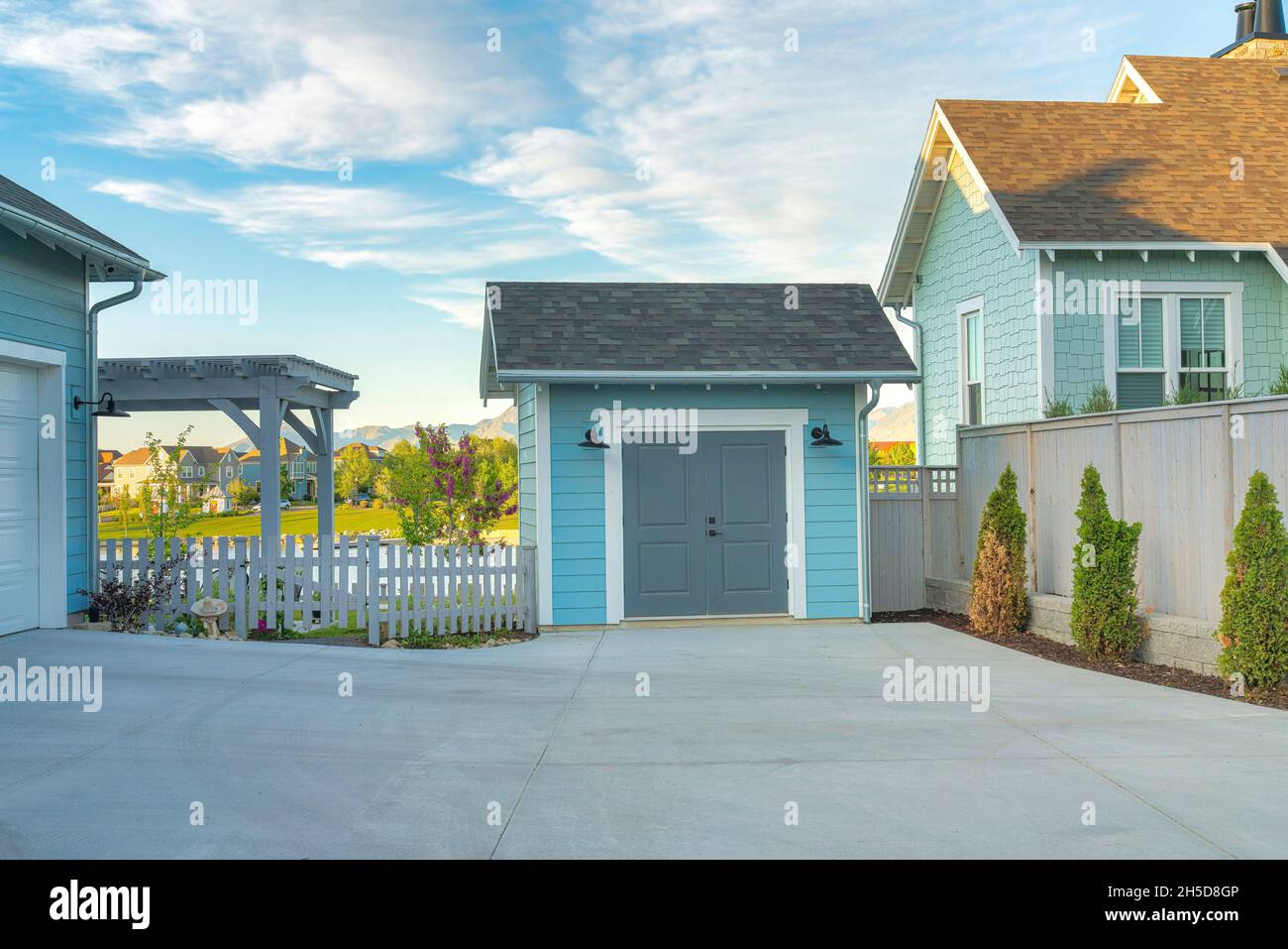 Light blue storage shed outside a house at Daybreak, Utah Stock Photo ...
