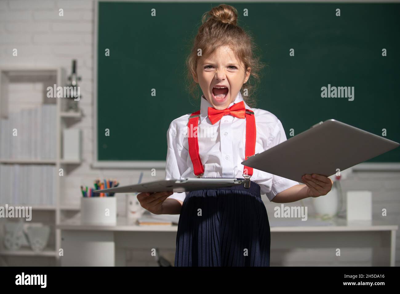 Angry kids at classroom hi-res stock photography and images - Alamy