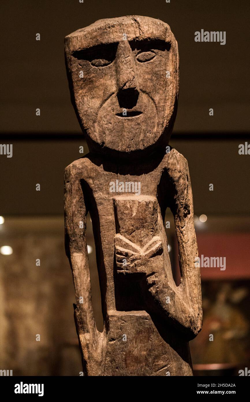 wooden sculpture of an ancestor with ceremonial vase, Chimu culture ...