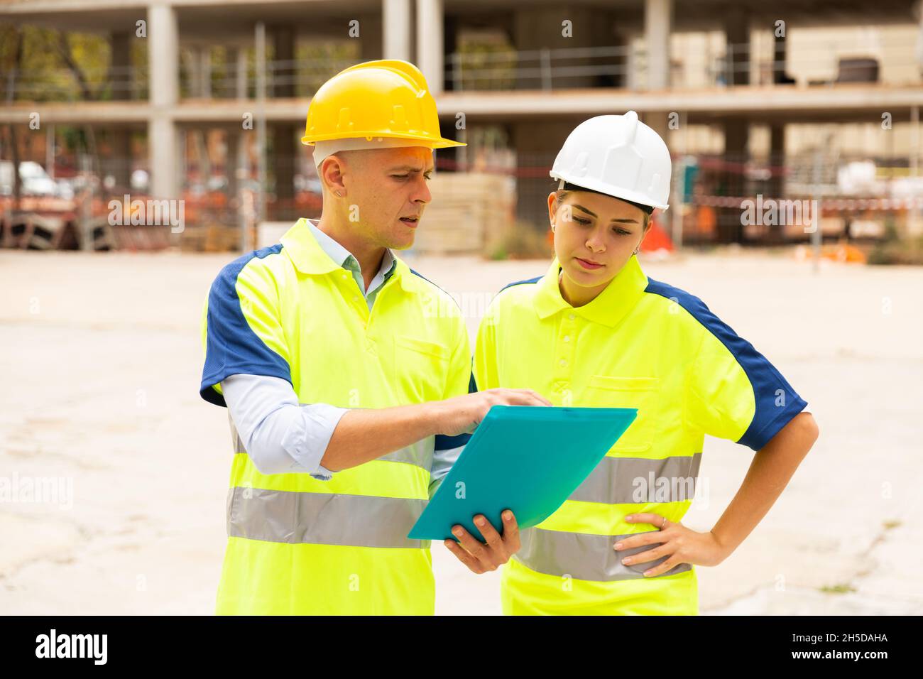 Man woman engineers construction site hi-res stock photography and ...