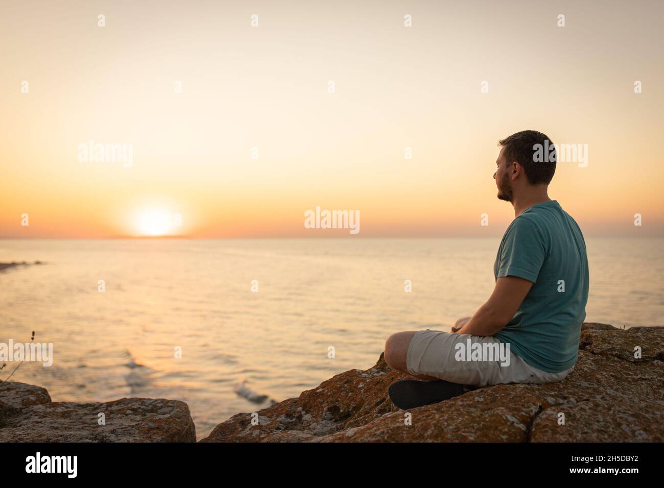 Side view man meditation on hi-res stock photography and images - Alamy