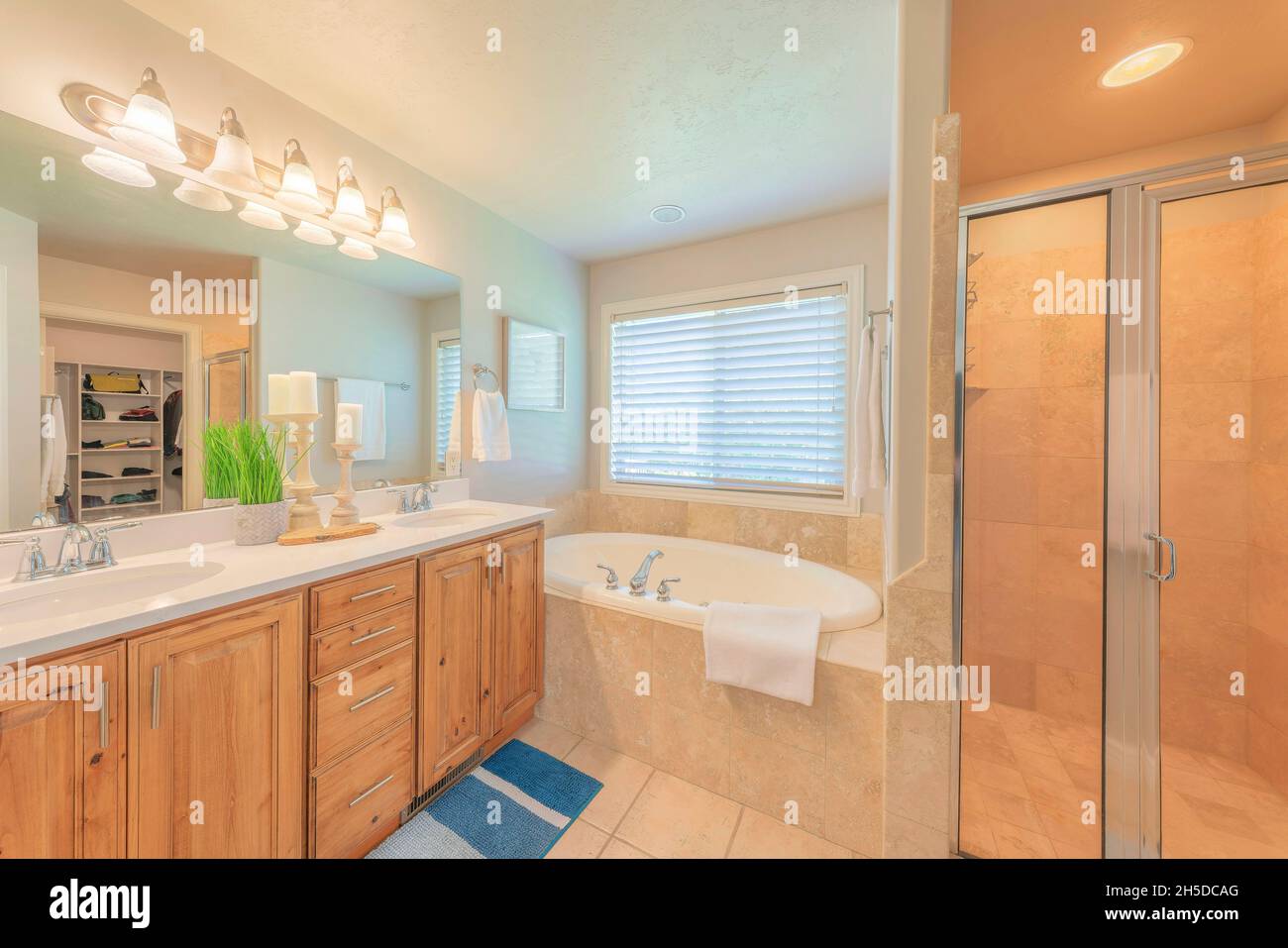 Traditional contemporary master bathroom interior with window Stock ...