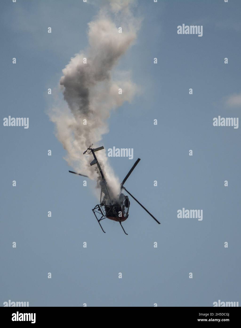 Vertical shot of an airplane performing an airshow Stock Photo - Alamy