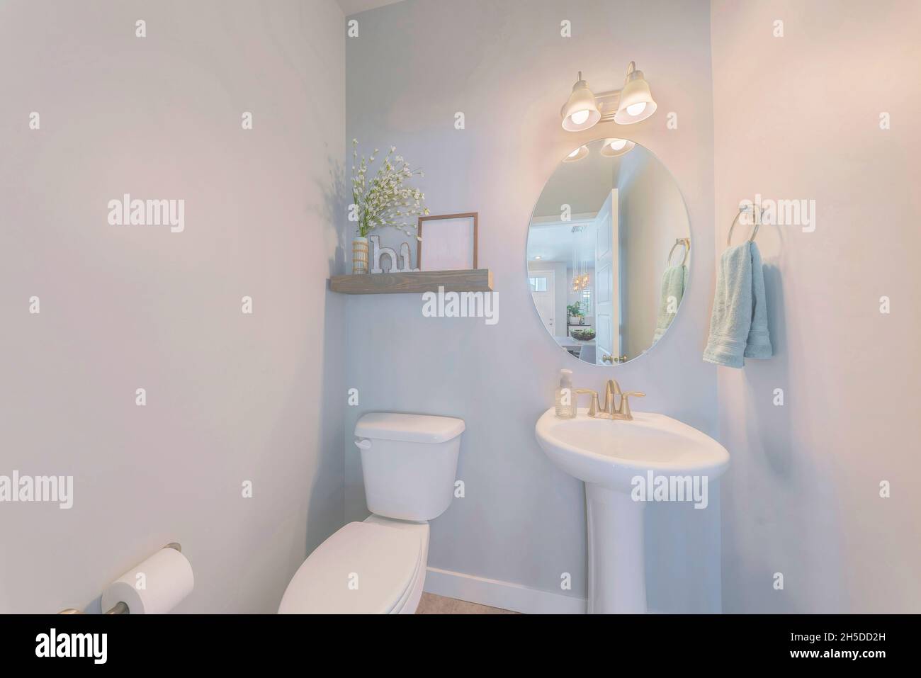Powder room interior with decorations on the shelf Stock Photo - Alamy