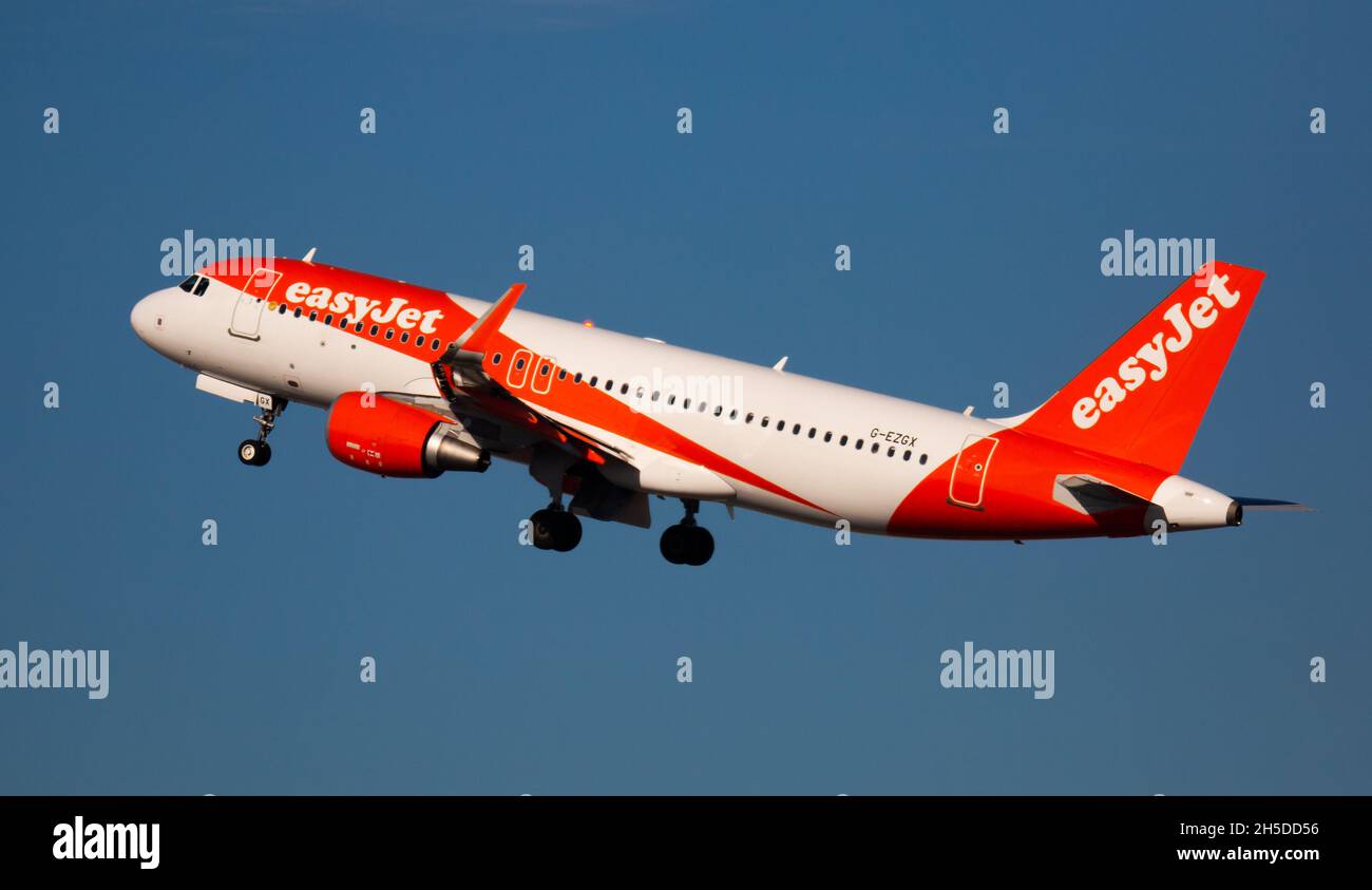 Passenger Airplane of EasyJet airlines taking off from airport Stock ...
