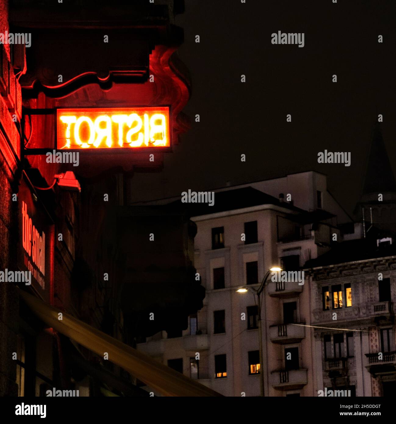Bistro sign at night, Milan, red sign Stock Photo - Alamy
