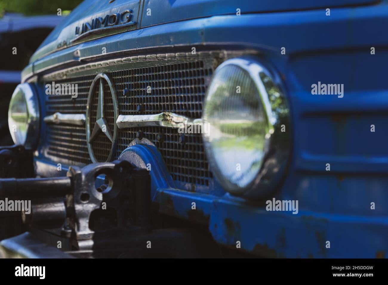 UNTERHACHING, GERMANY - Jun 01, 2019: A closeup of an old Unimog ...