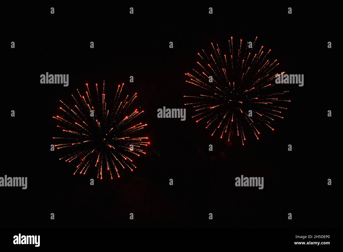 Fireworks exploded in the night sky Stock Photo - Alamy