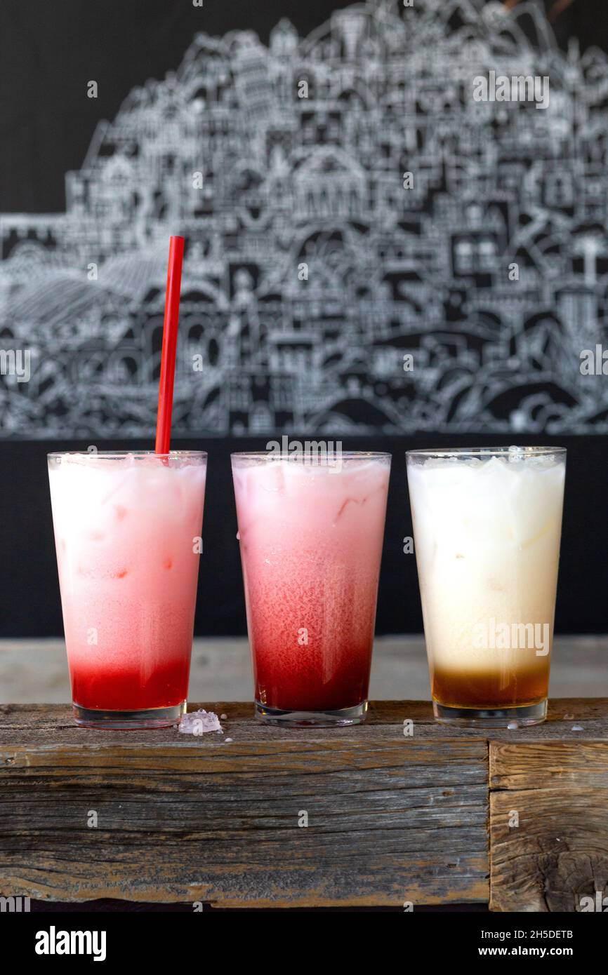 Vertical shot of three Italian soda drinks in a bar Stock Photo - Alamy