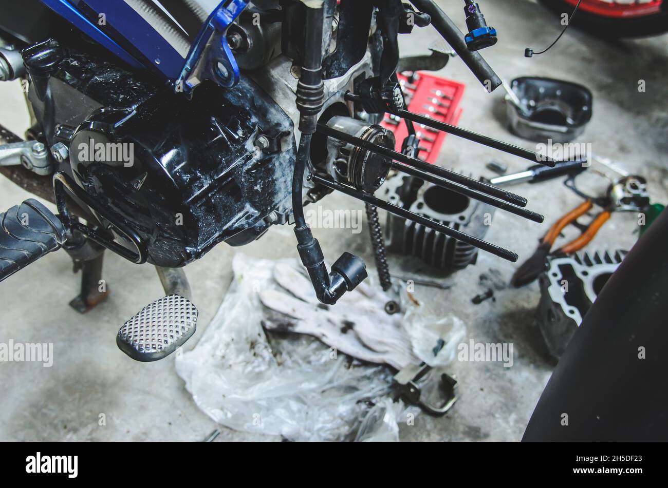 Mechanical repairs engine motorcycle Stock Photo - Alamy