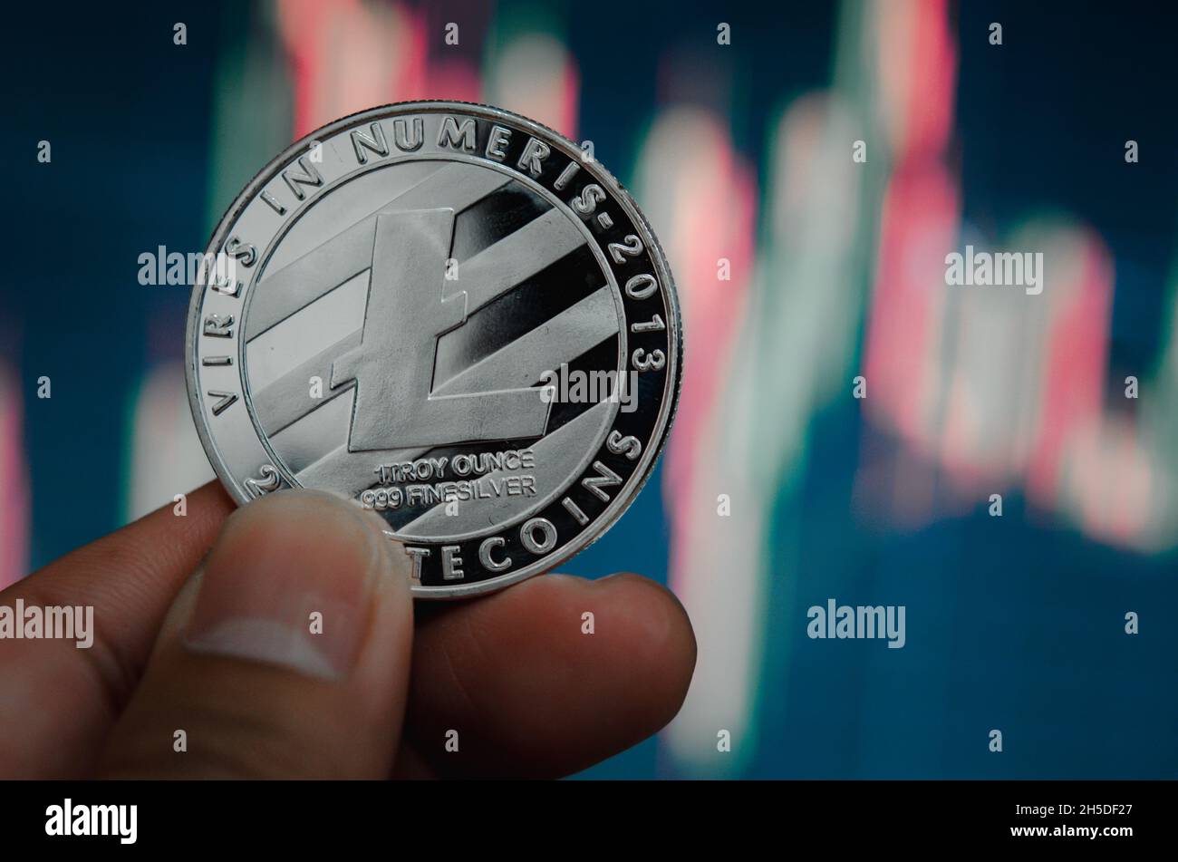 man hand cryptocurrency Litecoin and virtual money Business Finance and ...