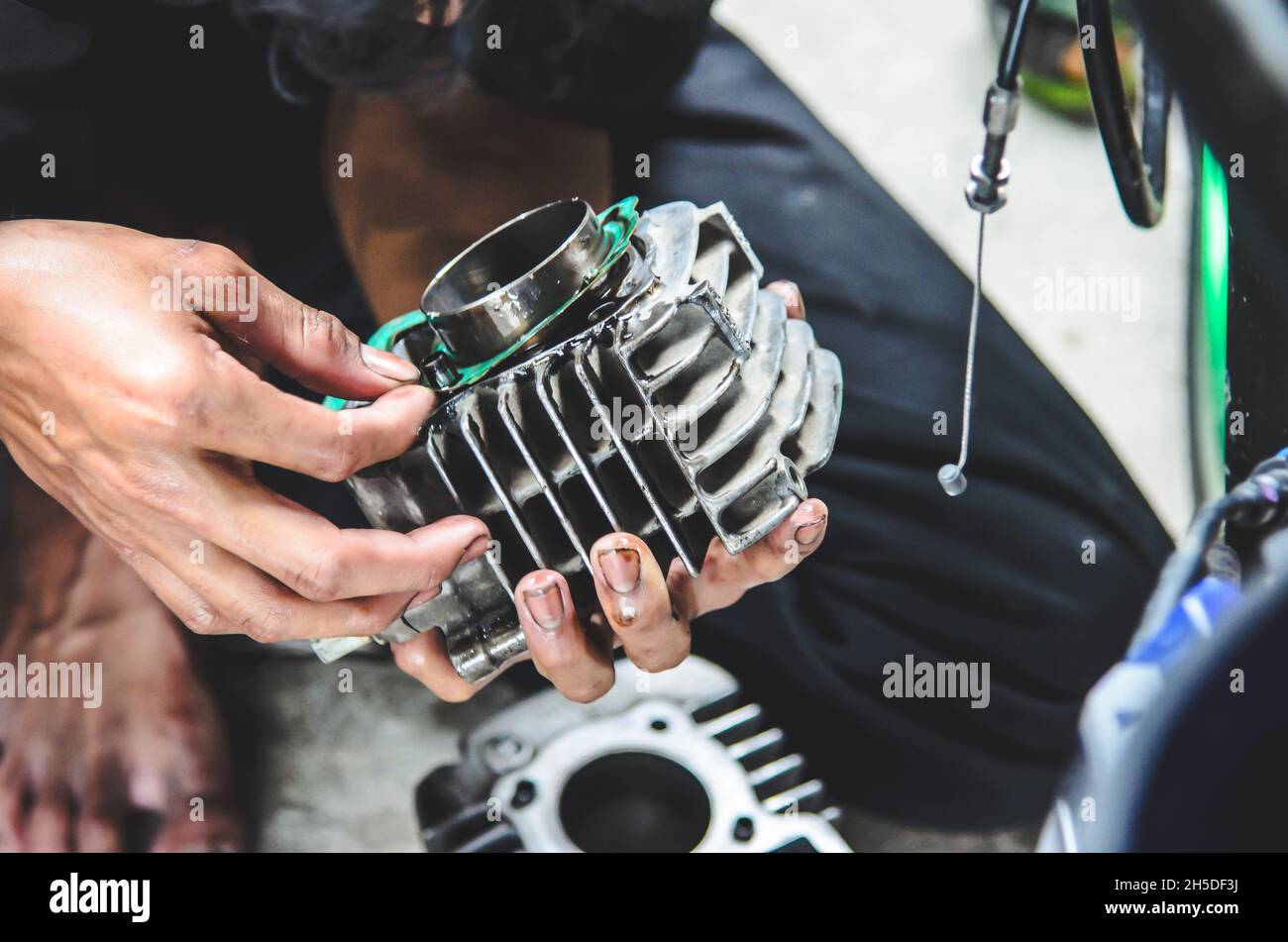 Mechanical repairs engine motorcycle Stock Photo - Alamy
