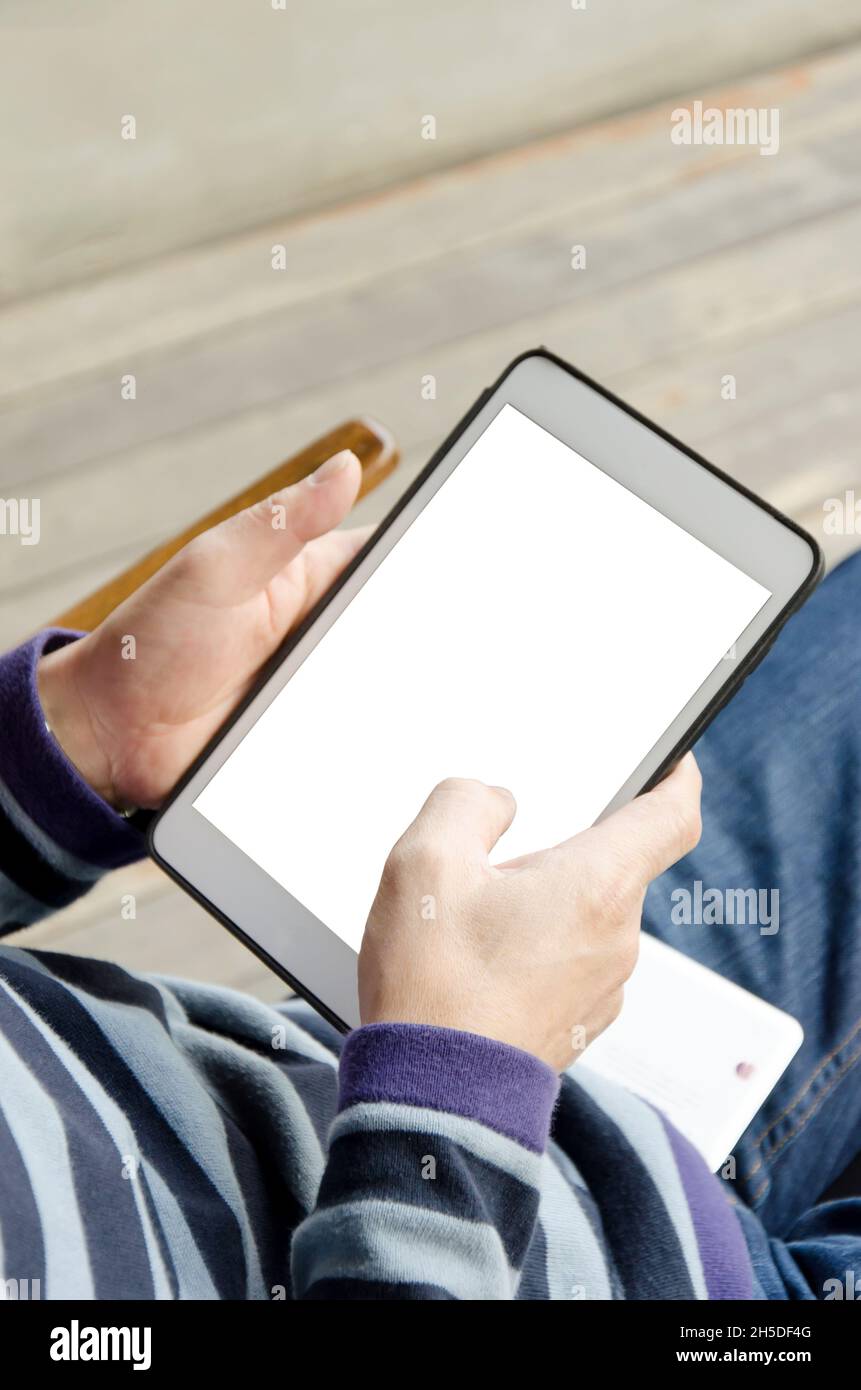 Close up hands multitasking man using tablet Stock Photo - Alamy Close up hands multitasking man using tablet Stock Photo - Alamy