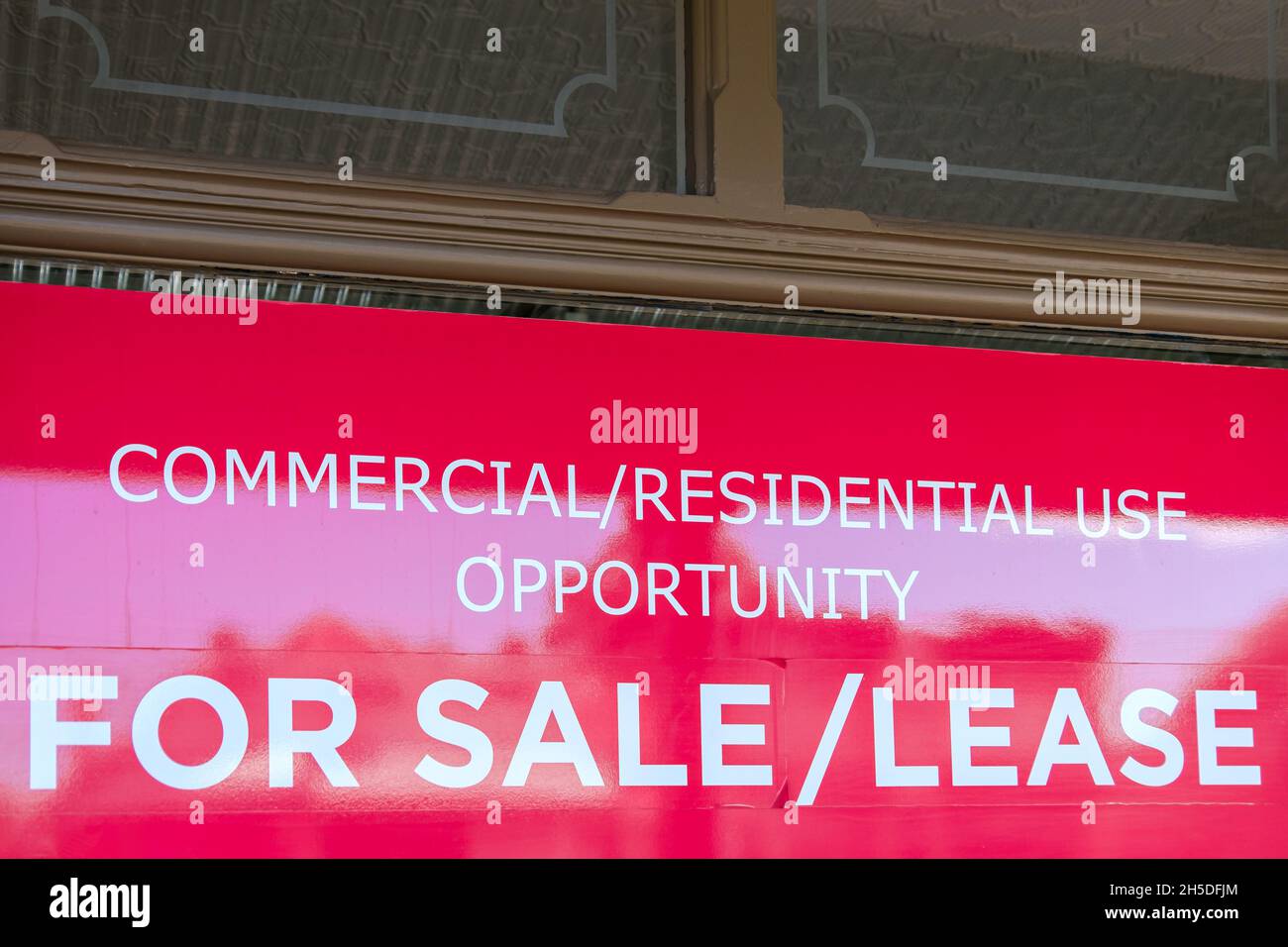 Property for rent banner displayed on the building facade in South ...