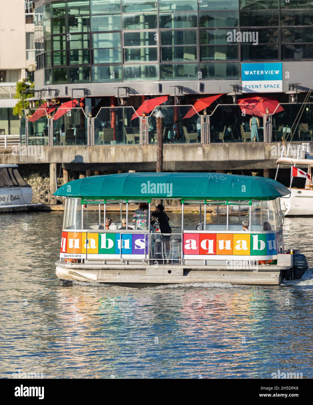 An Aquabus ferry approaches Granville Island Vancouver BC, Canada July ...