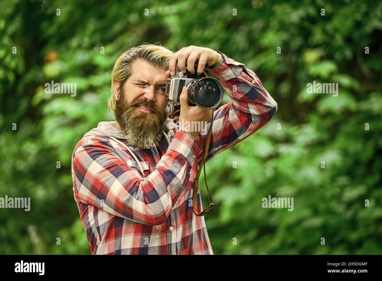 Photography in modern life. Hobby and professional occupation ...