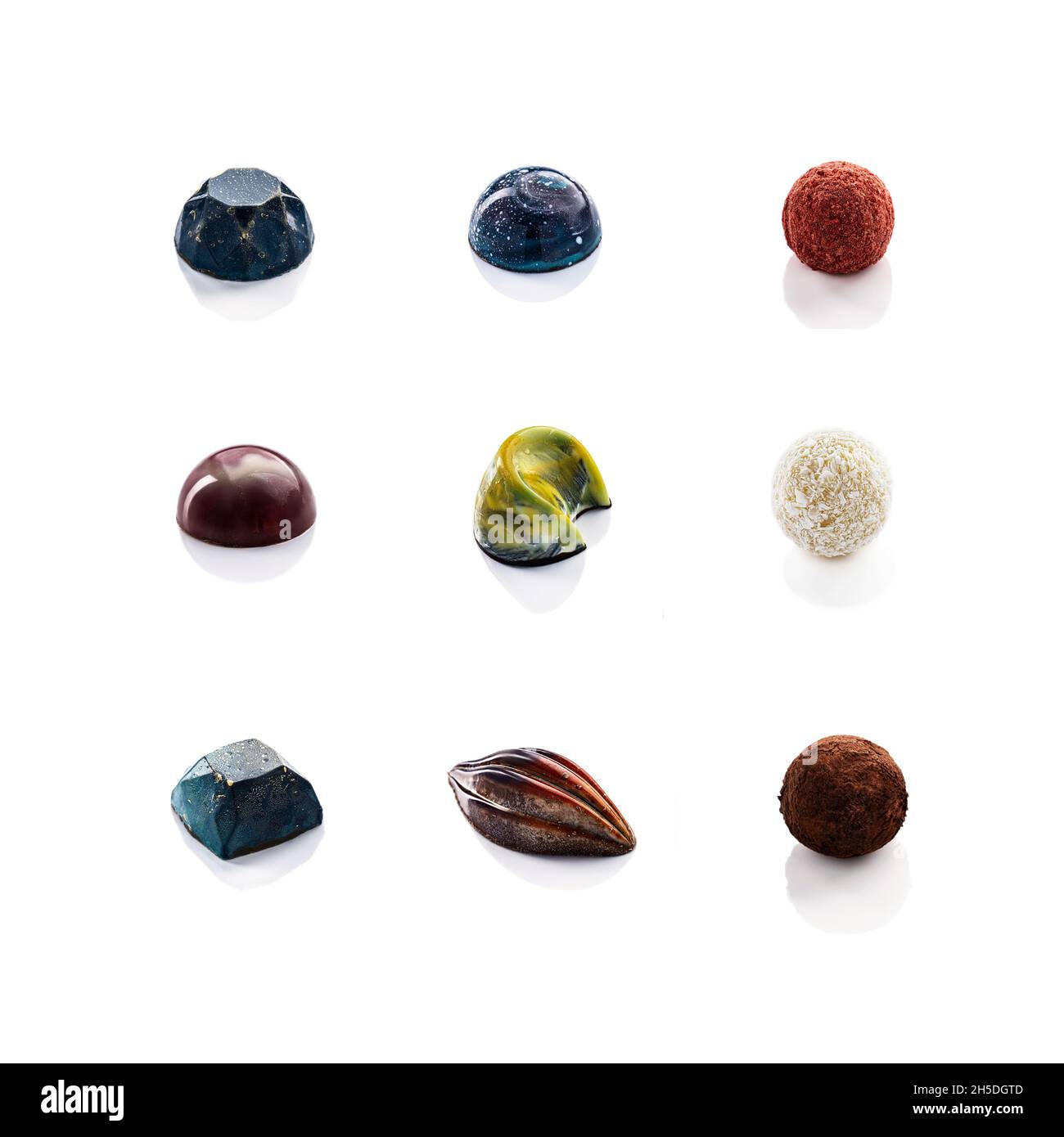 Set of handmade chocolates isolated on a white background Stock Photo ...