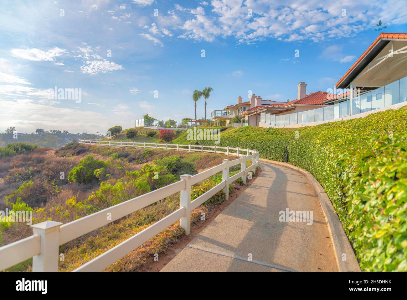 Concrete trail with white wooden railings at Southern California Stock ...