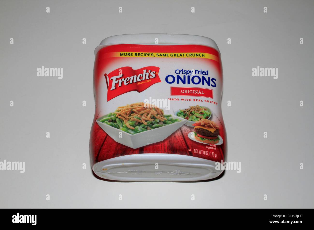 French's Crispy Fried Onions shot closeup that's in a plastic container ...