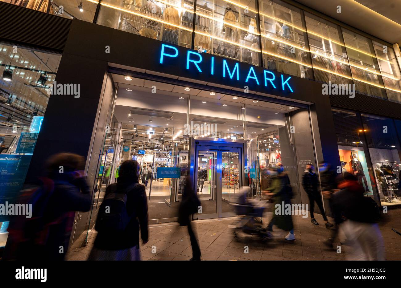 Berlin, Germany. 08th Nov, 2021. Passers-by walk past the Primark ...