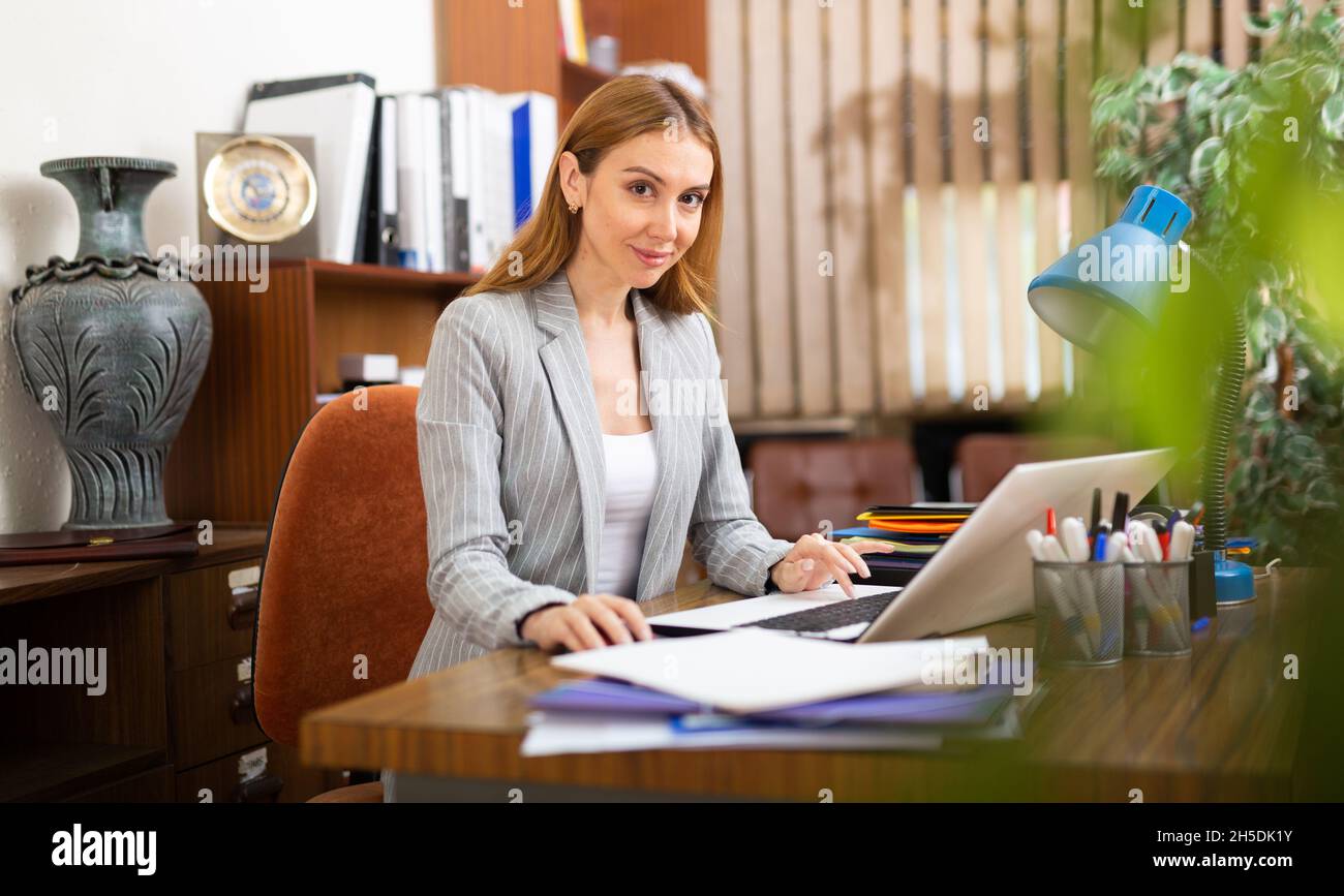 Female secretary working laptop hi-res stock photography and images - Alamy