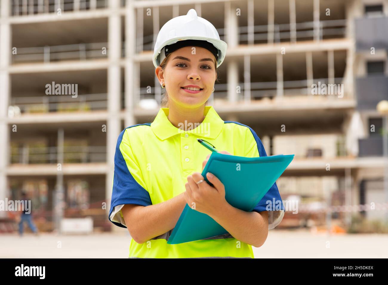 Girl engineer checking work process Stock Photo - Alamy